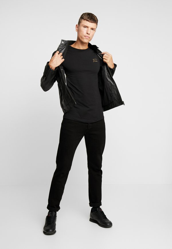 Reebok Classic CLASSIC LEATHER LOW-CUT DESIGN SHOES - Trainers - black ...