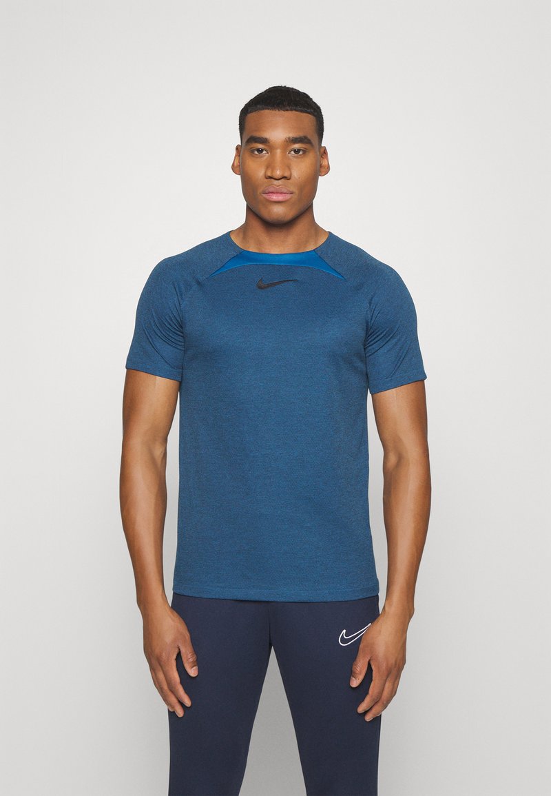 Nike Performance ACADEMY - Sports T-shirts - industrial blue/black/blå ...