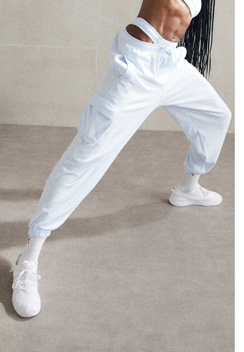 Puma FIT MOVE OVERSIZED JOGGER - Tracksuit bottoms - icy blue/light ...