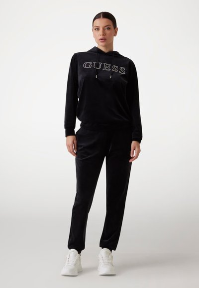 Guess COUTURE JOGGER PANTS - Jogginghose - jet black/schwarz - Zalando.at