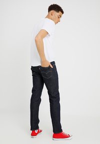 Levi's® 502 REGULAR TAPER - Vaqueros tapered - rock cod/azul oscuro ...