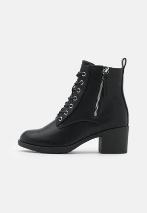 Botines con cordones de mujer | Online en Zalando