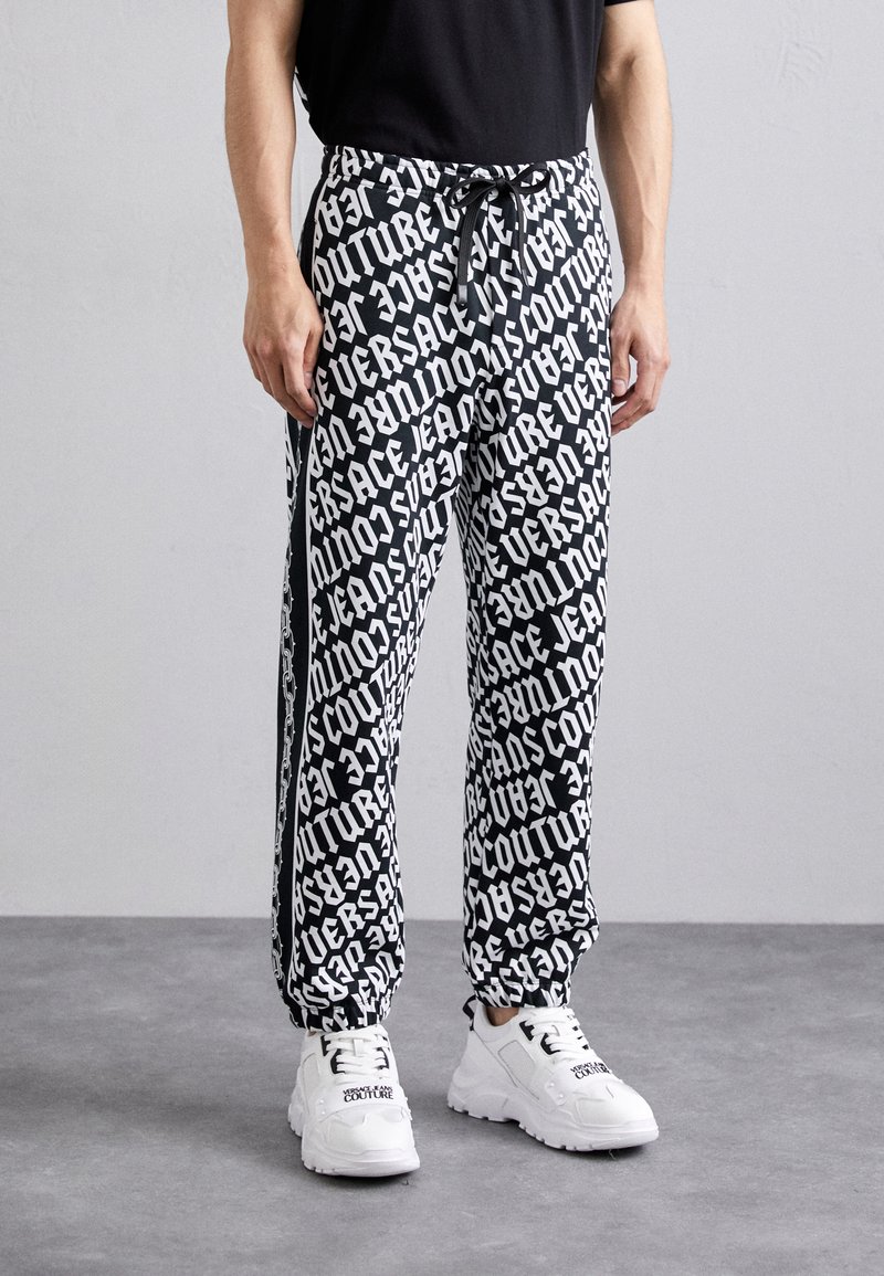 Versace Jeans Couture Tracksuit bottoms - black/white/black - Zalando.ie