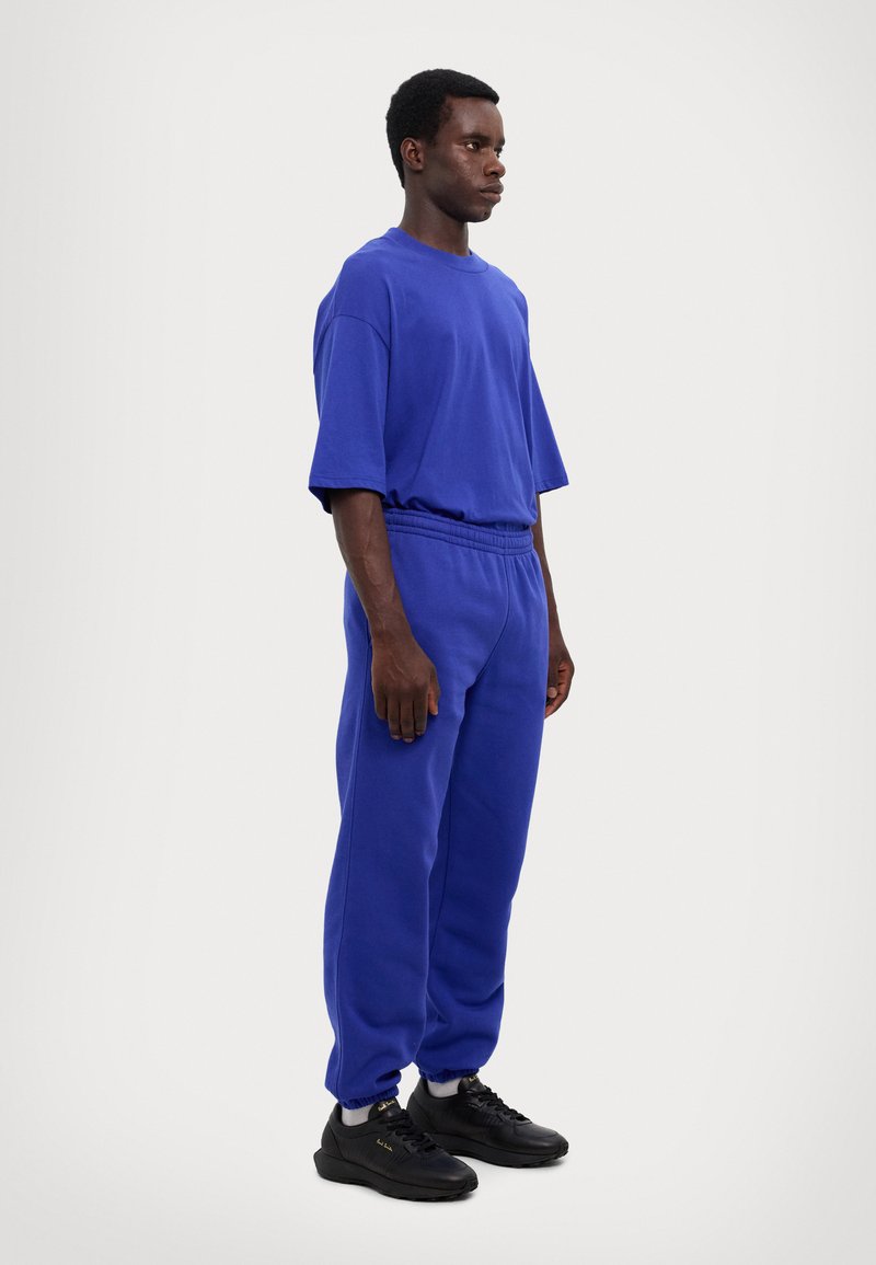 7 DAYS Active ORGANIC UNISEX - Pantalon de survêtement - bluing/bleu - ZALANDO.FR