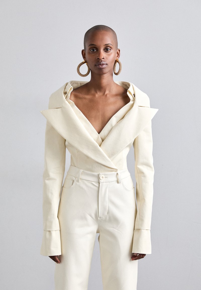 A.W.A.K.E. MODE LOW CUT DÉCOLLETÉ WITH SHIRTING DETAILING - Pusero ...