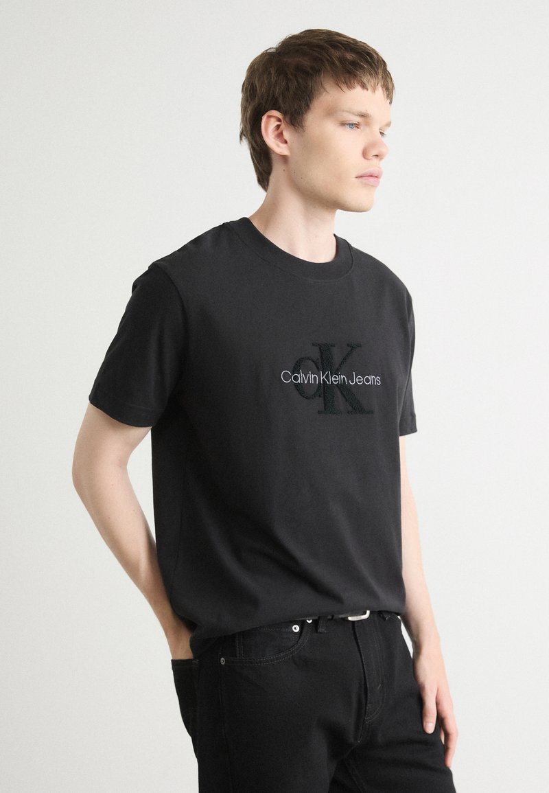 Calvin Klein Jeans MONOLOGO TEE - Camiseta estampada - black/negro - Zalando.es