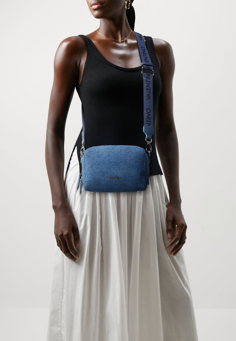 Valentino Bags PATTIE - Across body bag - light blue denim/light-blue ...