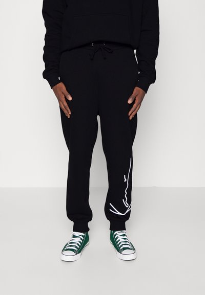 Karl Kani ESSENTIAL TRACKSUIT SET UNISEX - Trainingsanzug - black ...