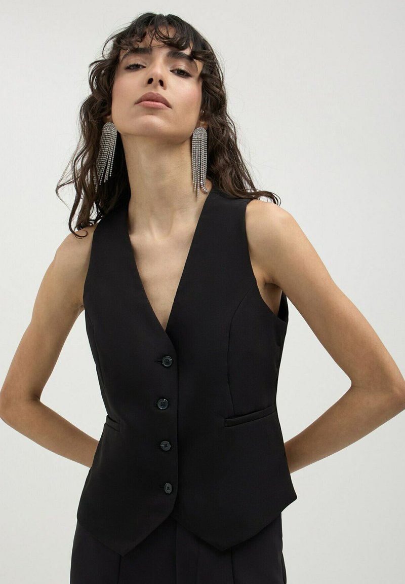Calliope CON BOTTONI - Smanicato - nero - Zalando.it