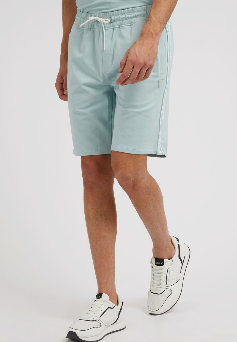 Guess Logoband Jogginghose Himmelblau Hellblau Zalando Ch
