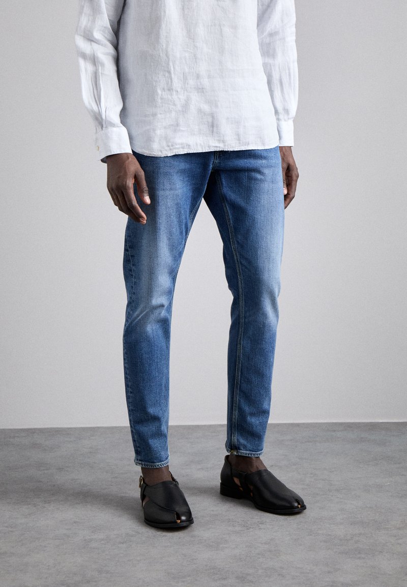 Tiger of Sweden PISTOLERO - Jeans Slim Fit - light blue/light-blue ...