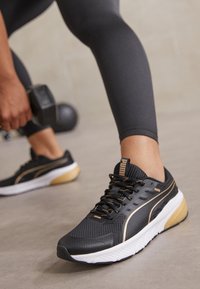 Puma CELL GLARE - Training shoe - black/gold/white/anthracite - Zalando