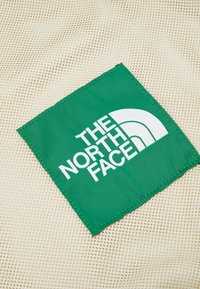 The North Face CIRCULAR TOTE UNISEX - Sports bag - gravel/beige ...