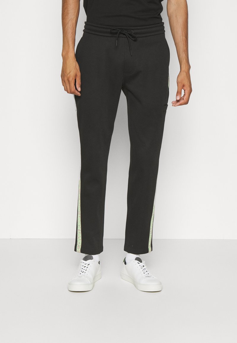 Calvin Klein Jeans Cut Off Logo Tape Pant Tracksuit Bottoms Black