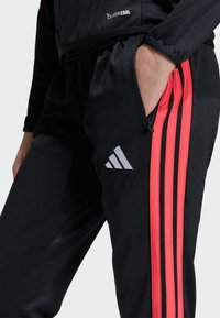 adidas Performance TIRO26 LEAGUE - Jogginghose - black semi lucid red ...
