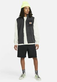 Nike Sportswear SPU TF POLAR FLC - Weste - dark smoke grey black black ...