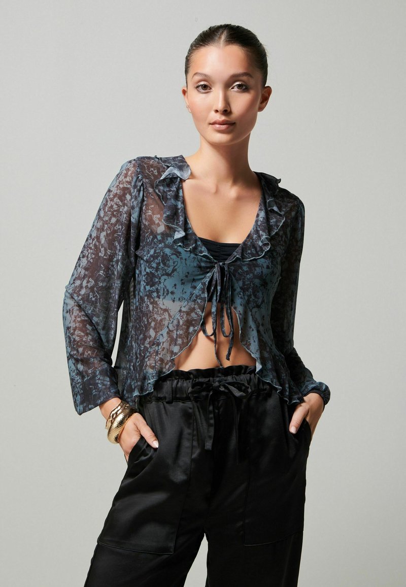 Next RUFFLE - Blusa - teal blue snake print/azul - Zalando.es