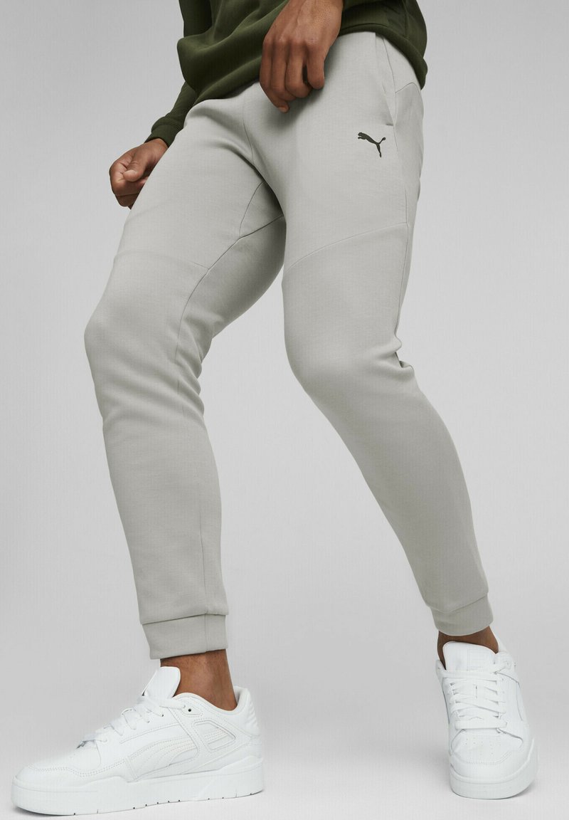 Puma TECH DK JOGGING - Tracksuit bottoms - concrete gray/grey - Zalando.de