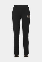 EA7 Emporio Armani TROUSER - Pantalones deportivos - black/gold coloured/negro - Zalando.es