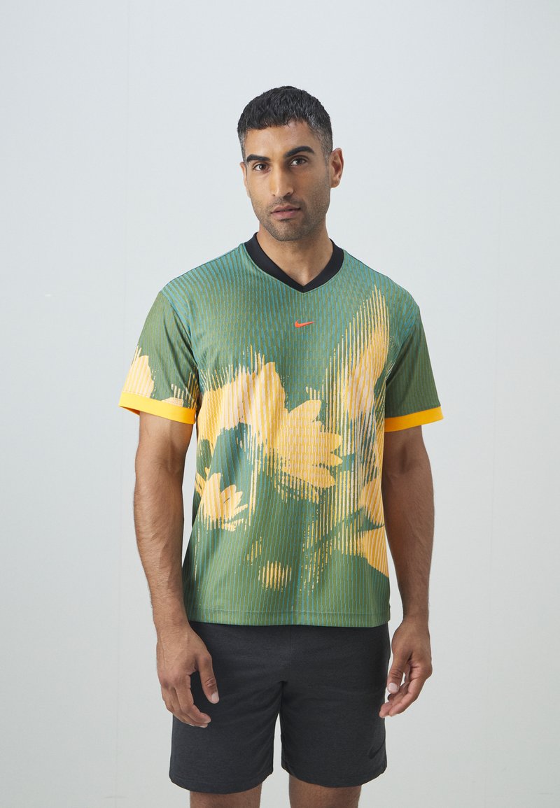 Nike Performance COF - Camiseta deportiva - bicoastal/black/sundial ...