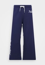 Polo Ralph Lauren ANKLE ATHLETIC - Tracksuit bottoms - newport navy ...