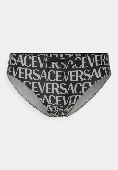 Versace SWIM ALL OVER PRINT - Swimming briefs - black/white/black ...