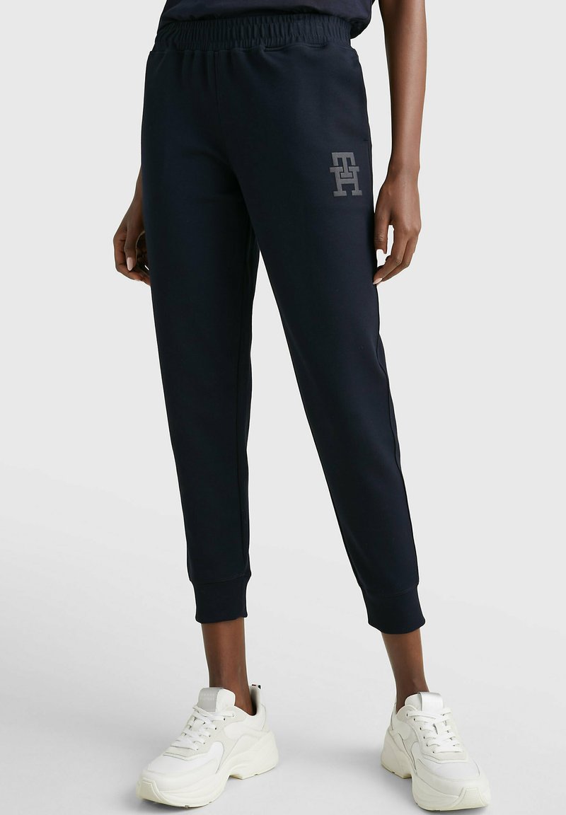 Tommy Hilfiger SPORT MONOGRAM CUFFED - Tracksuit bottoms - desert sky ...