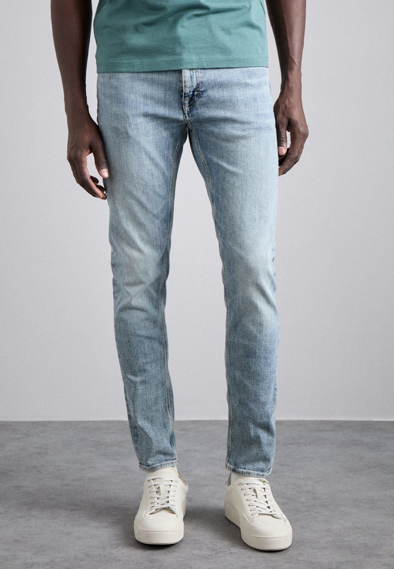 Tiger of Sweden EVOLVE - Slim fit jeans - light blue/lichtblauw ...