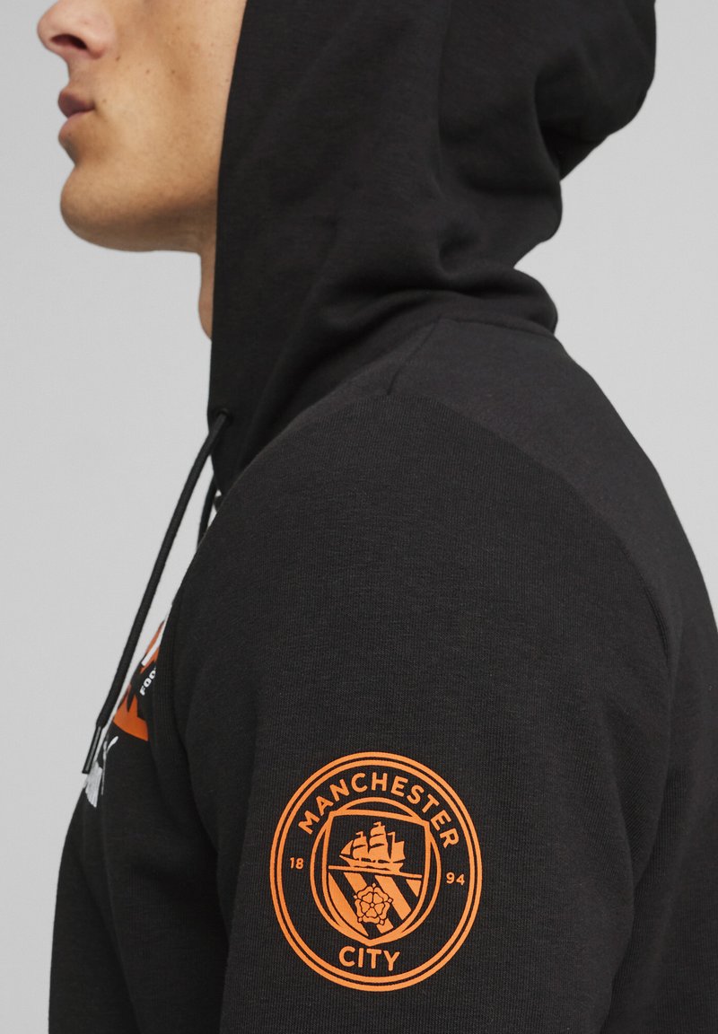 Puma MANCHESTER CITY FTBLICONS - Sweater met rits - black cayenne ...
