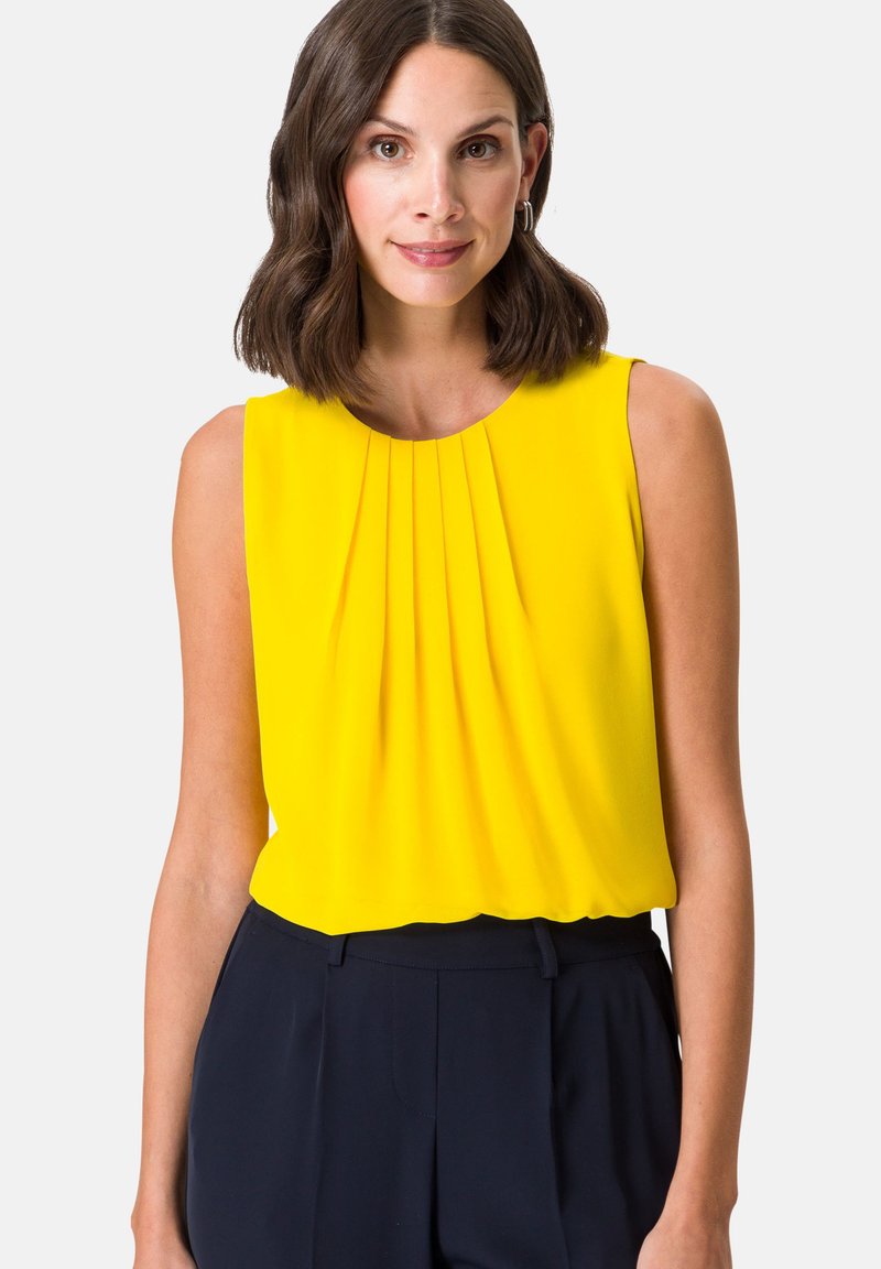 zero MIT RUNDHALSAUSSCHNITT - Top - misted marigold/gelb - Zalando.de