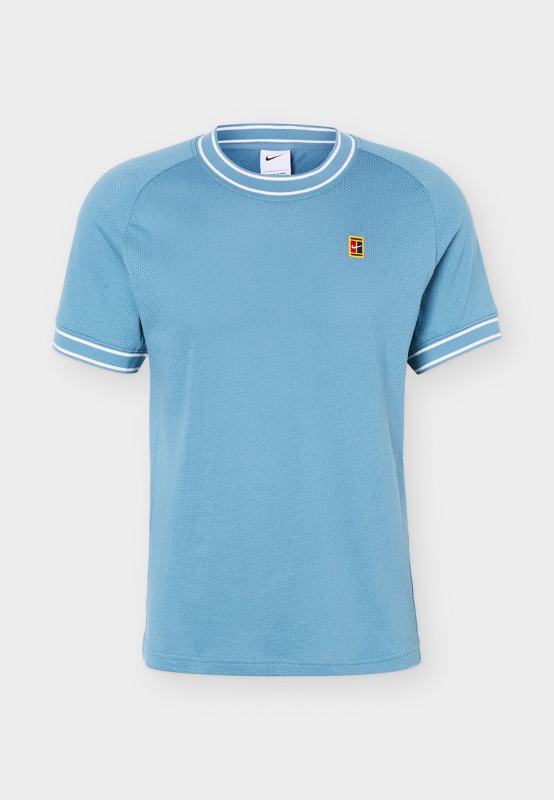 Nike Performance HERITAGE - Sport T-Shirt - smokey blue/hellblau - Zalando