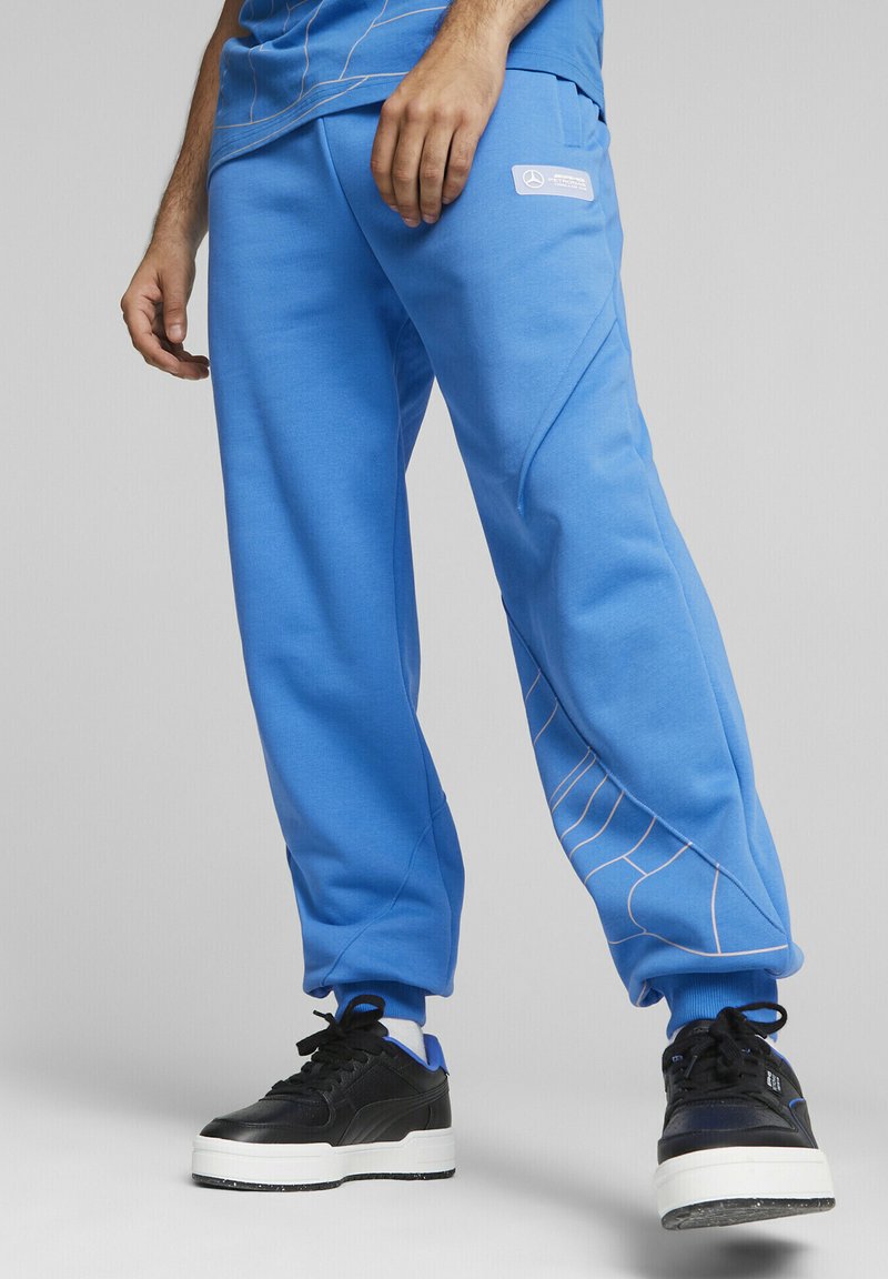 Puma MERCEDES-AMG PETRONAS STATEMENT - Tracksuit bottoms - ultra blue ...