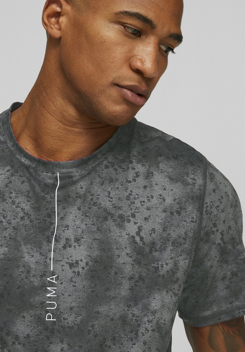 Puma STUDIO YOGINI LITE - T-shirts print - black/sort - Zalando.dk