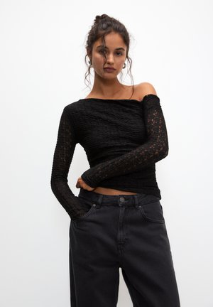 Sorte bluser & skjorter til dame | Zalando