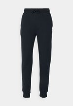 KARL LAGERFELD PANTS - Tracksuit bottoms - midnight blue/dark blue ...