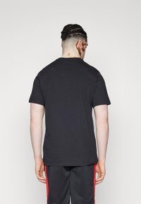 Nike Sportswear TEE SOLE RALLY - T-Shirt print - black/schwarz - Zalando.at