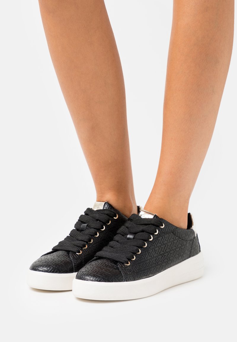 Tamaris Zapatillas - black/gold/negro - Zalando.es