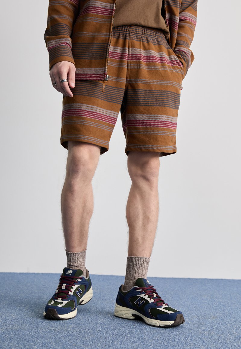 KAVU SEABOARD - Tracksuit bottoms - bronze brown/brown - Zalando.ie