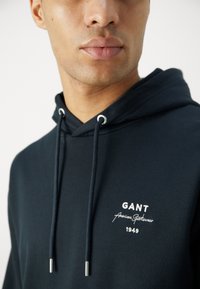 GANT LOGO SCRIPT HOODIE - Sweatshirt - black/schwarz - Zalando.ch