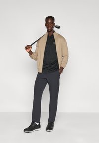 EA7 Emporio Armani GOLF PRO GRAPHIC - Poloshirts - fancy black/sort ...