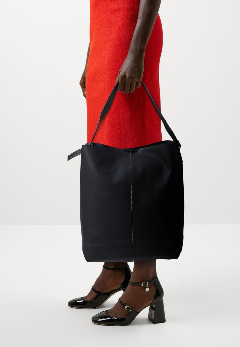 Becksöndergaard GLOSSY MAE BAG - Shopping Bag - black/schwarz - Zalando.ch