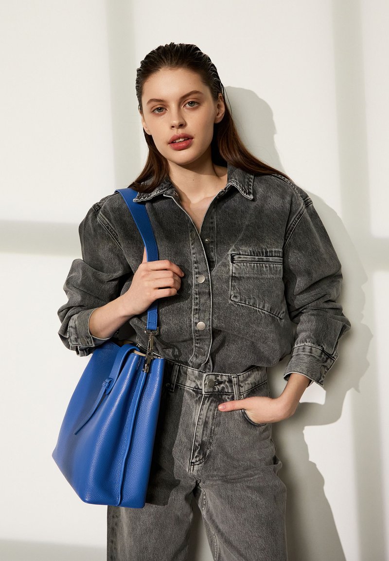 Ekonika Across body bag - denim/blue - Zalando