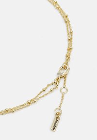 Pilgrim ELKA ANKLE CHAIN - Ankelkæder - gold-coloured/guldfarvet - Zalando.dk