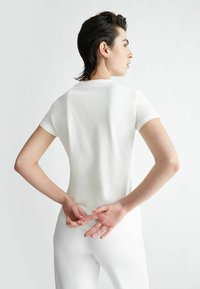 Liu Jo Jeans T-Shirt print - ivory pocket/weiß - Zalando.de