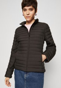 Calvin Klein PACKABLE SUPER PADDED JACKET - Daunenjacke - black/schwarz ...