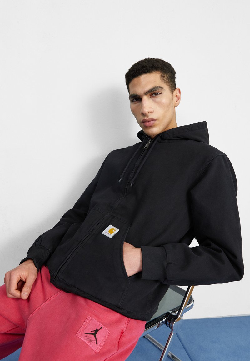Carhartt WIP ACTIVE JACKET - Light jacket - black heavy stone wash ...