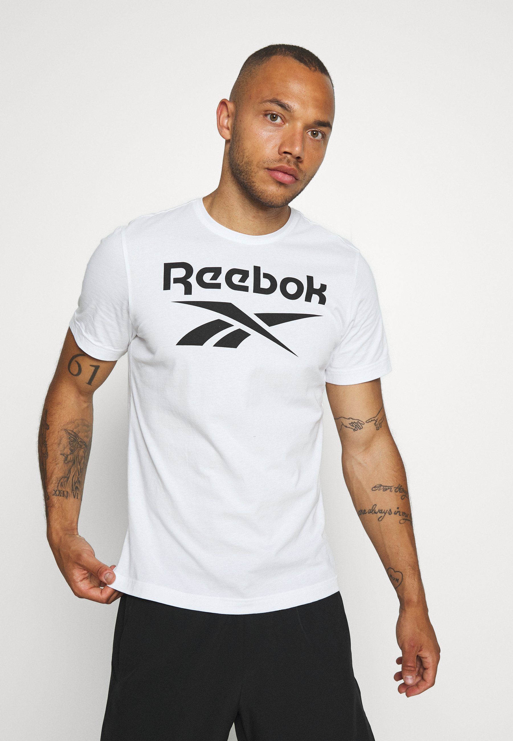 Reebok T shirt z nadrukiem bia y Zalando.pl