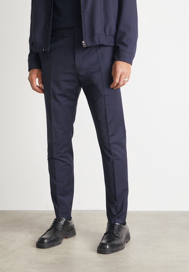 HUGO HOWARD - Trousers - dark blue - Zalando
