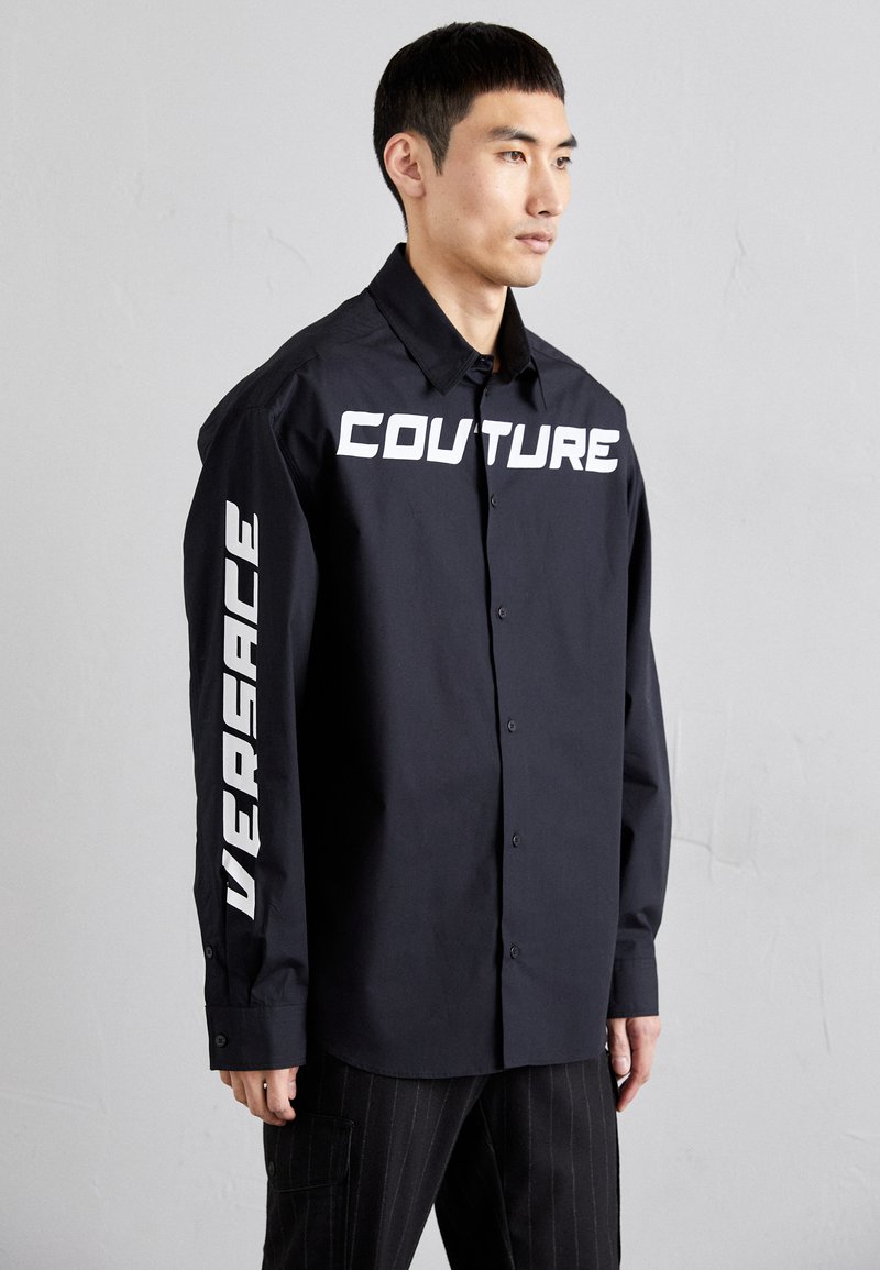 Versace Jeans Couture LOGO LINE - Shirt - black - Zalando.co.uk