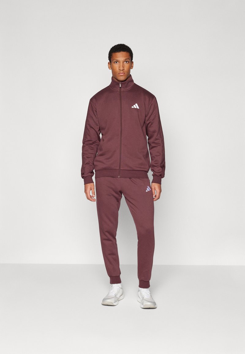adidas Sportswear BASIC STRIPES SET - Tracksuit - aurora ruby/dark red ...
